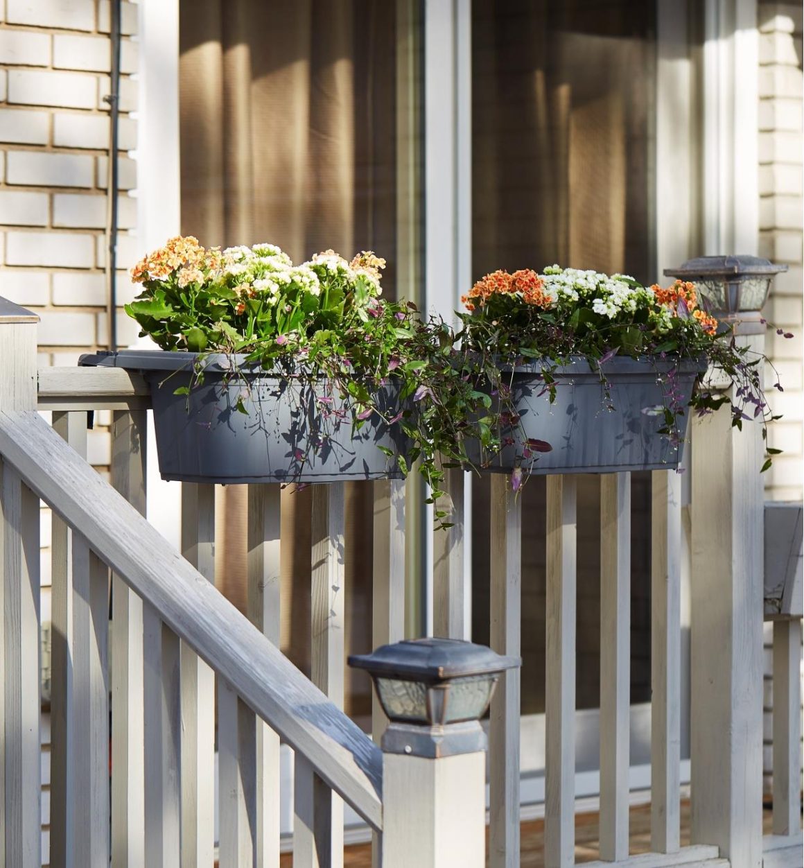 30 Gorgeous Ideas for Your Deck Railing Planters - EdgeFurnish